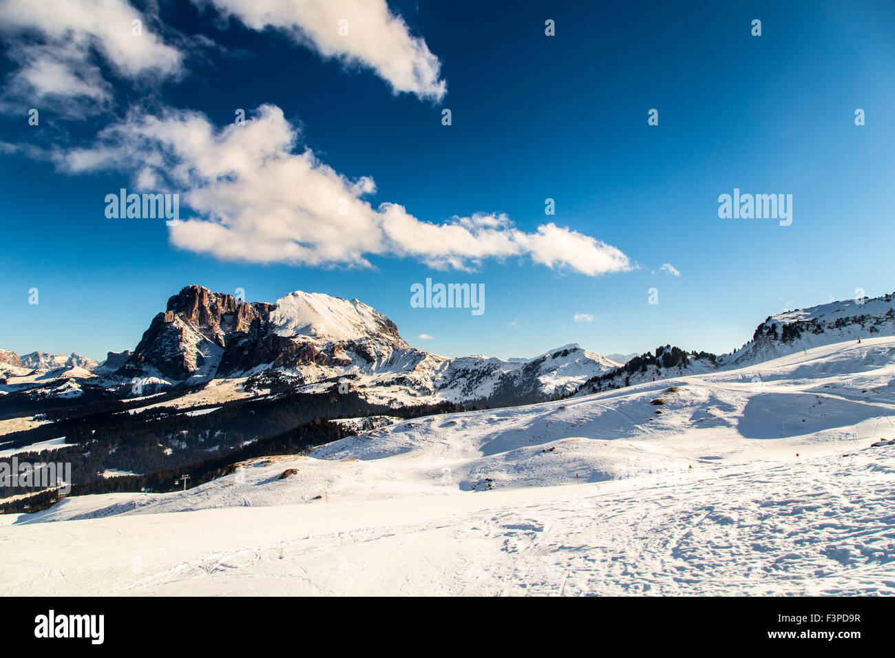 winter in the italian alps, with the ski slope full of snow Stock Photo ...
