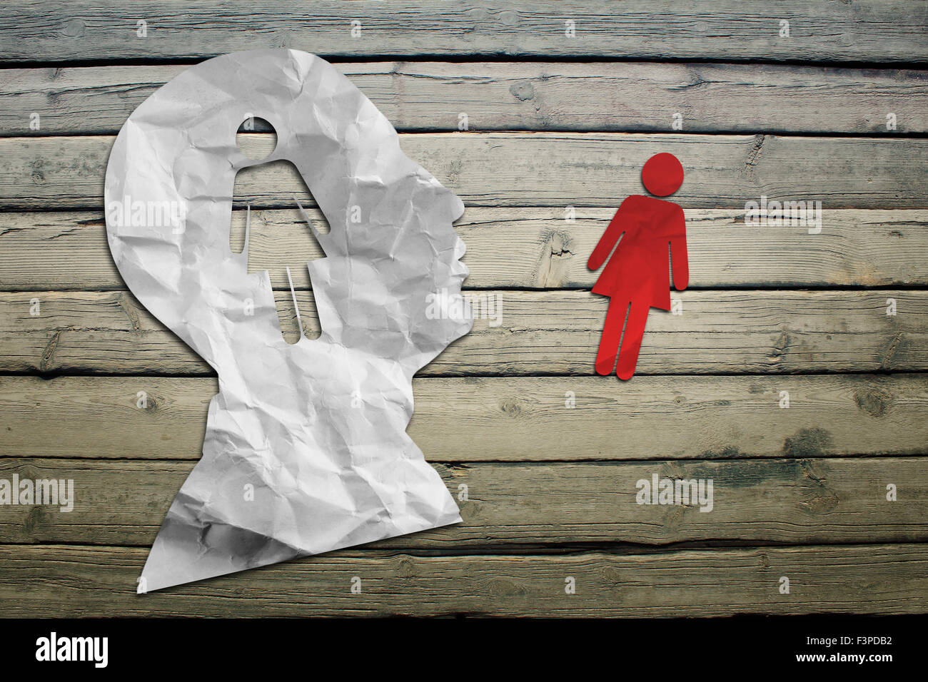 Paper humans head with woman symbol Stock Photo - Alamy