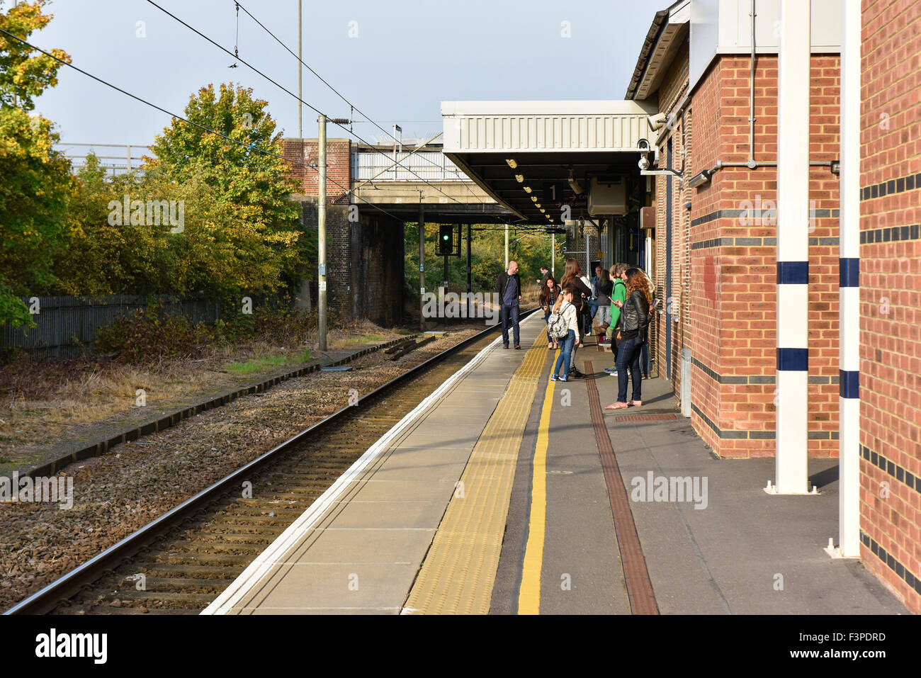 People standing on a platform at Laindon Station waiting for the ...