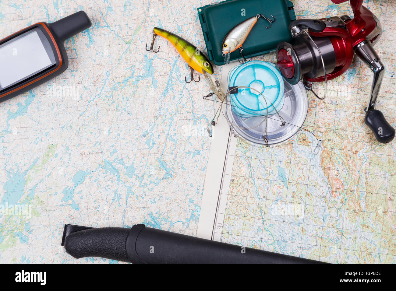 preparation in fishing journey with fishing tackles and gps navigator ...