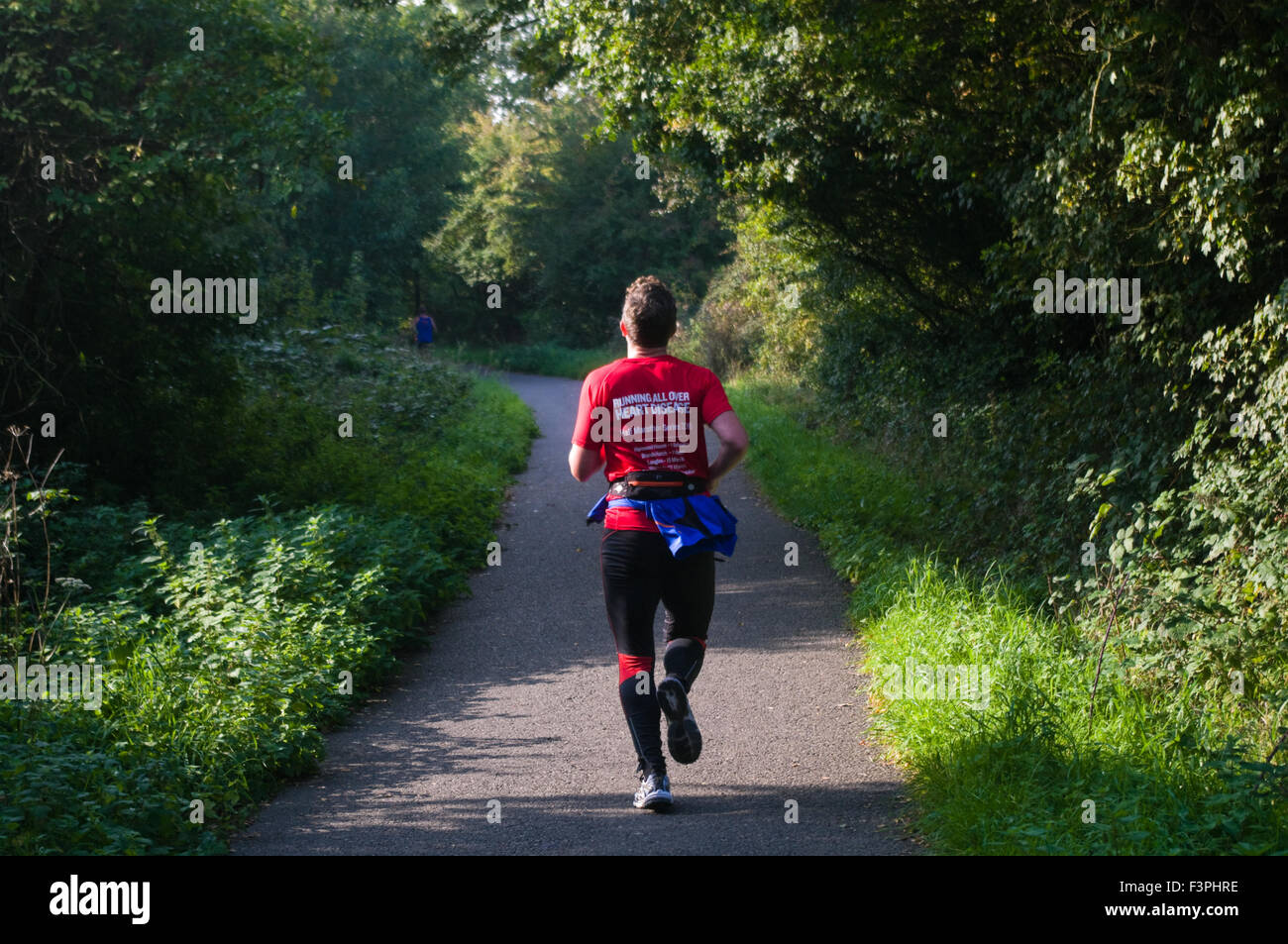 Chichester, West Sussex, England, 11th September 2015. A runner in the ...