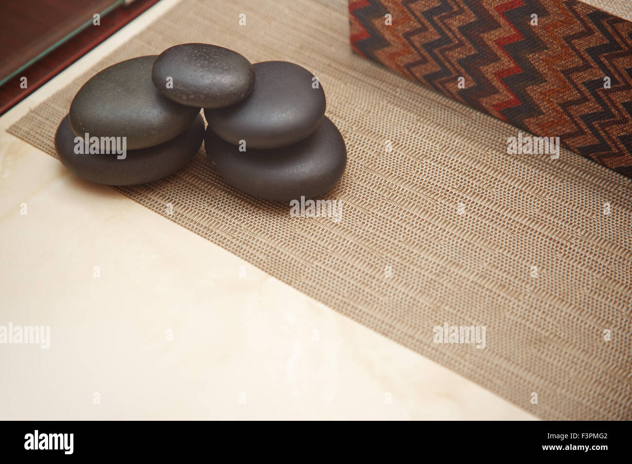 Stones for spa procedure. Close-up photo Stock Photo - Alamy