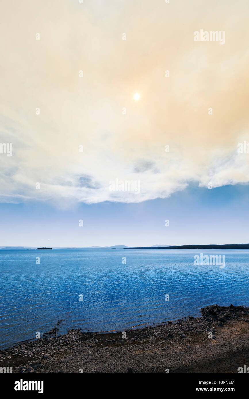 Smoke from a controlled forest fire over Yellowstone Lake; Yellowstone ...