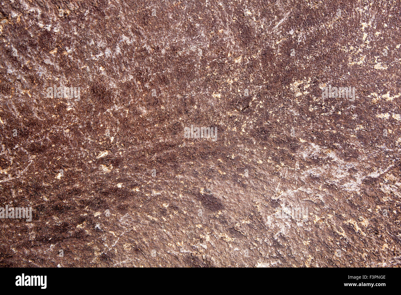 Closeup of a red stone structure for background Stock Photo - Alamy