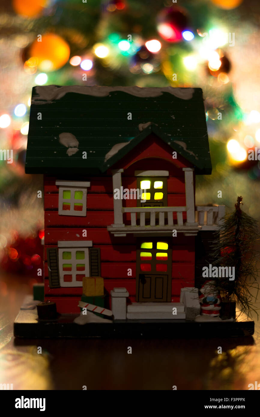 The photograph shows a house with a Christmas tree Stock Photo - Alamy