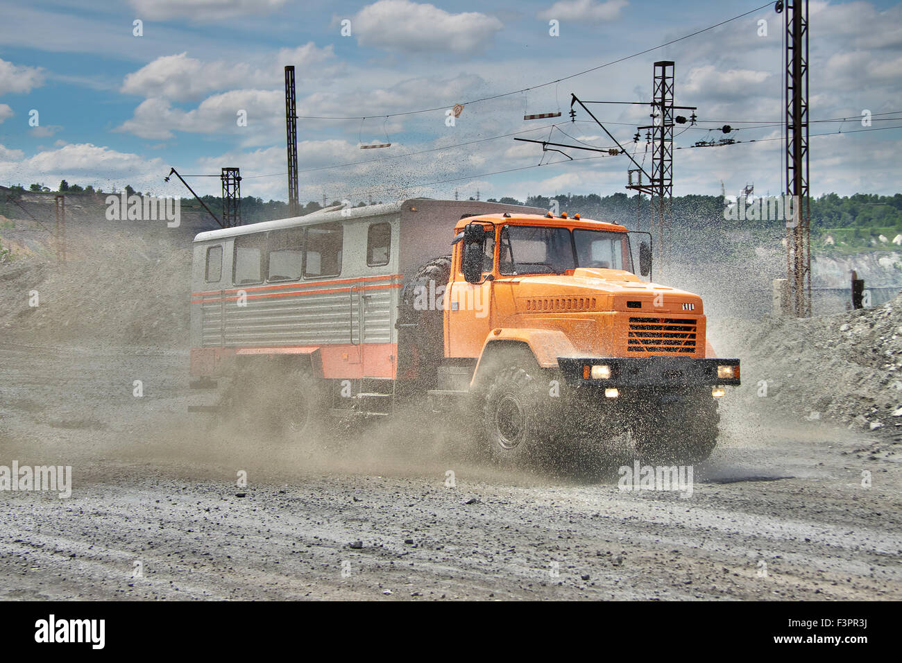Poltava Region, UKraine - June 26, 2010: Mining crew bus driving along ...