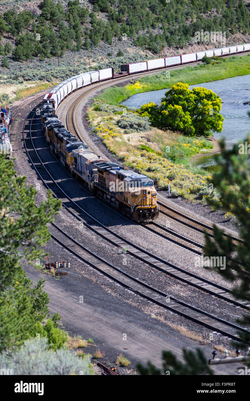 Union Pacific freight train along Yampa River; northwestern Colorado ...