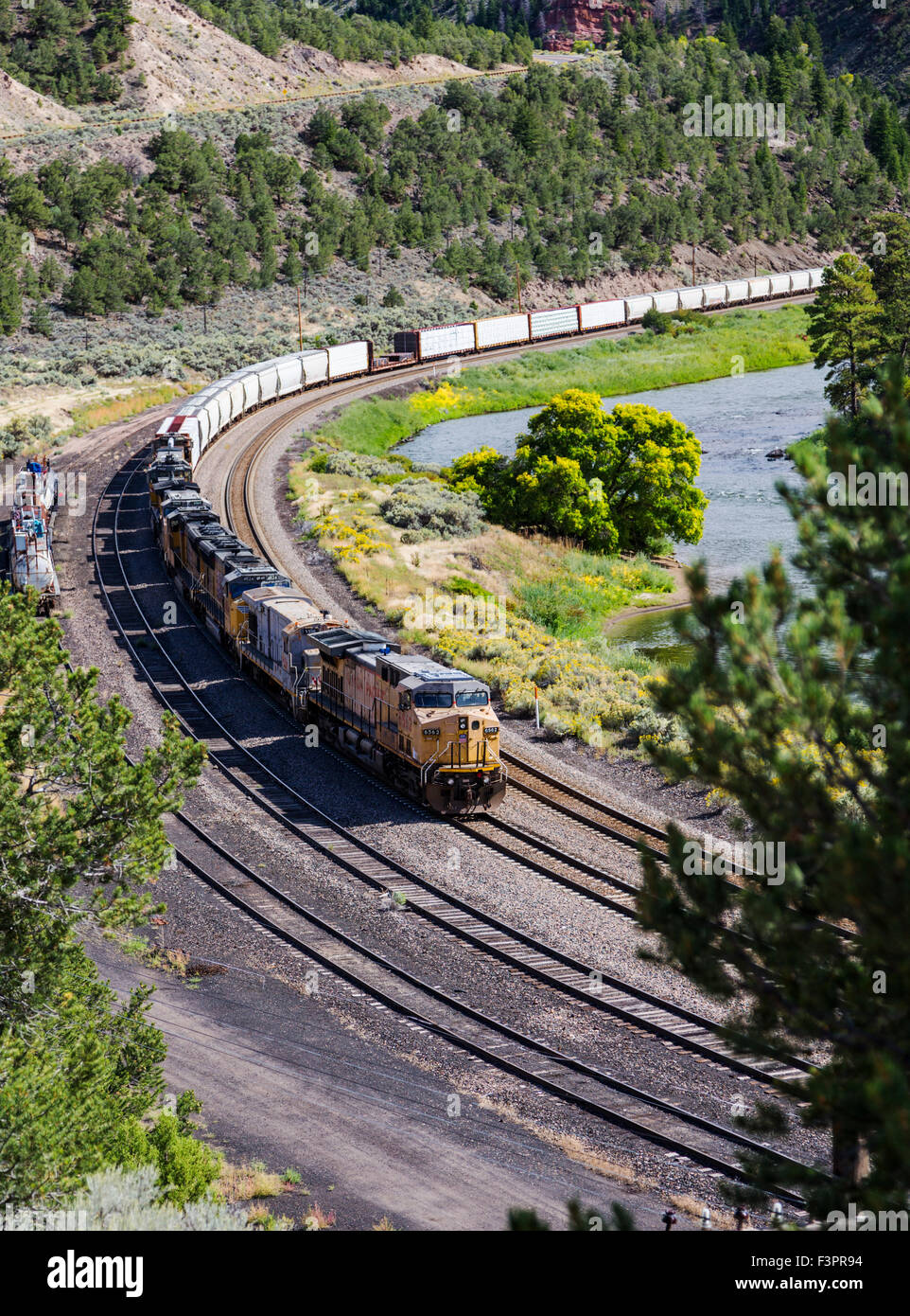 Union Pacific freight train along Yampa River; northwestern Colorado ...