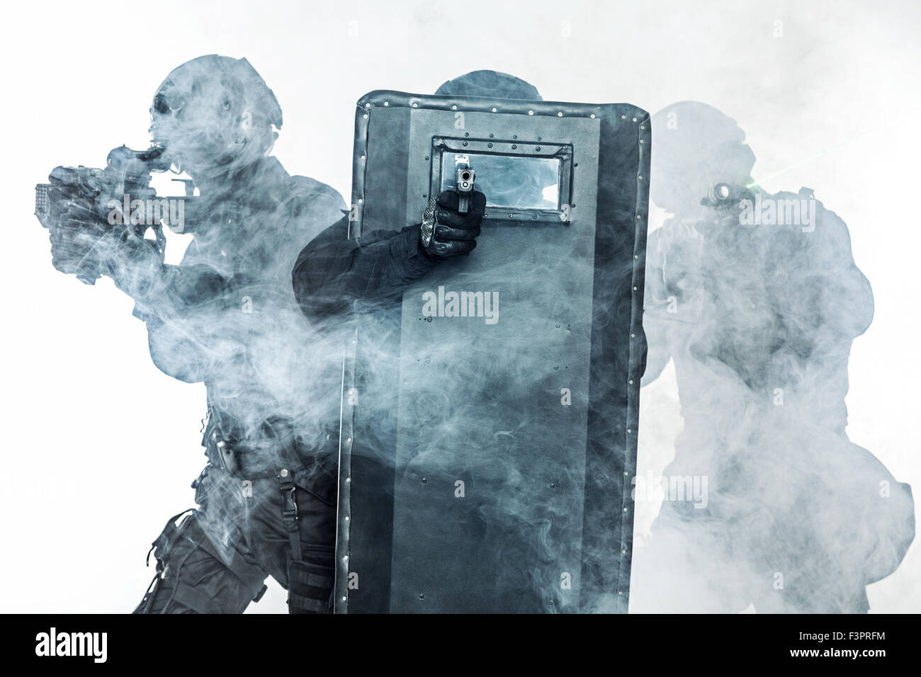 Swat officers gun shield hi-res stock photography and images - Alamy