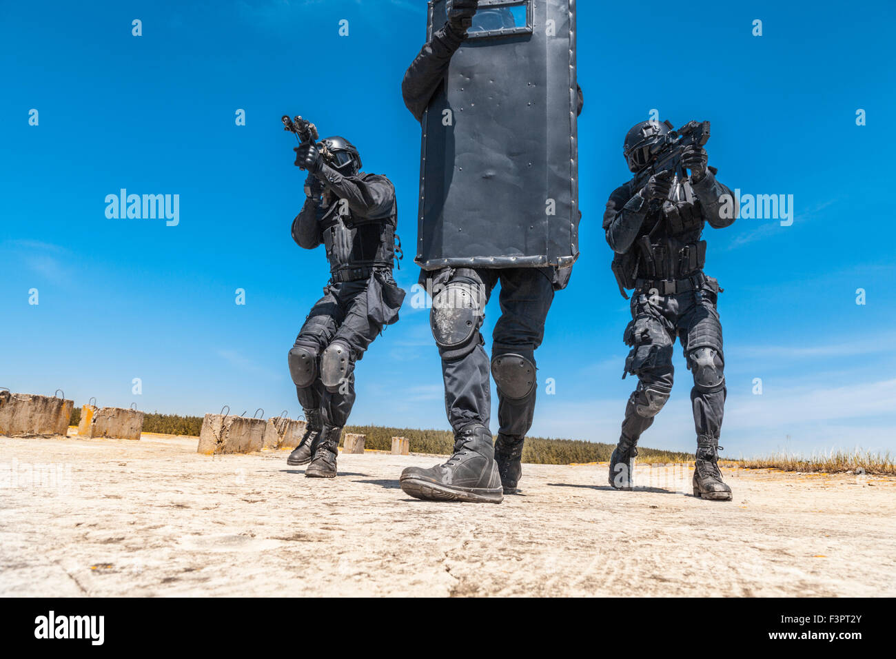 Swat officers gun shield hi-res stock photography and images - Alamy