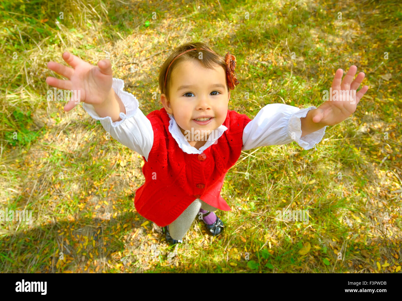 Little girl giving a hug Stock Photo - Alamy