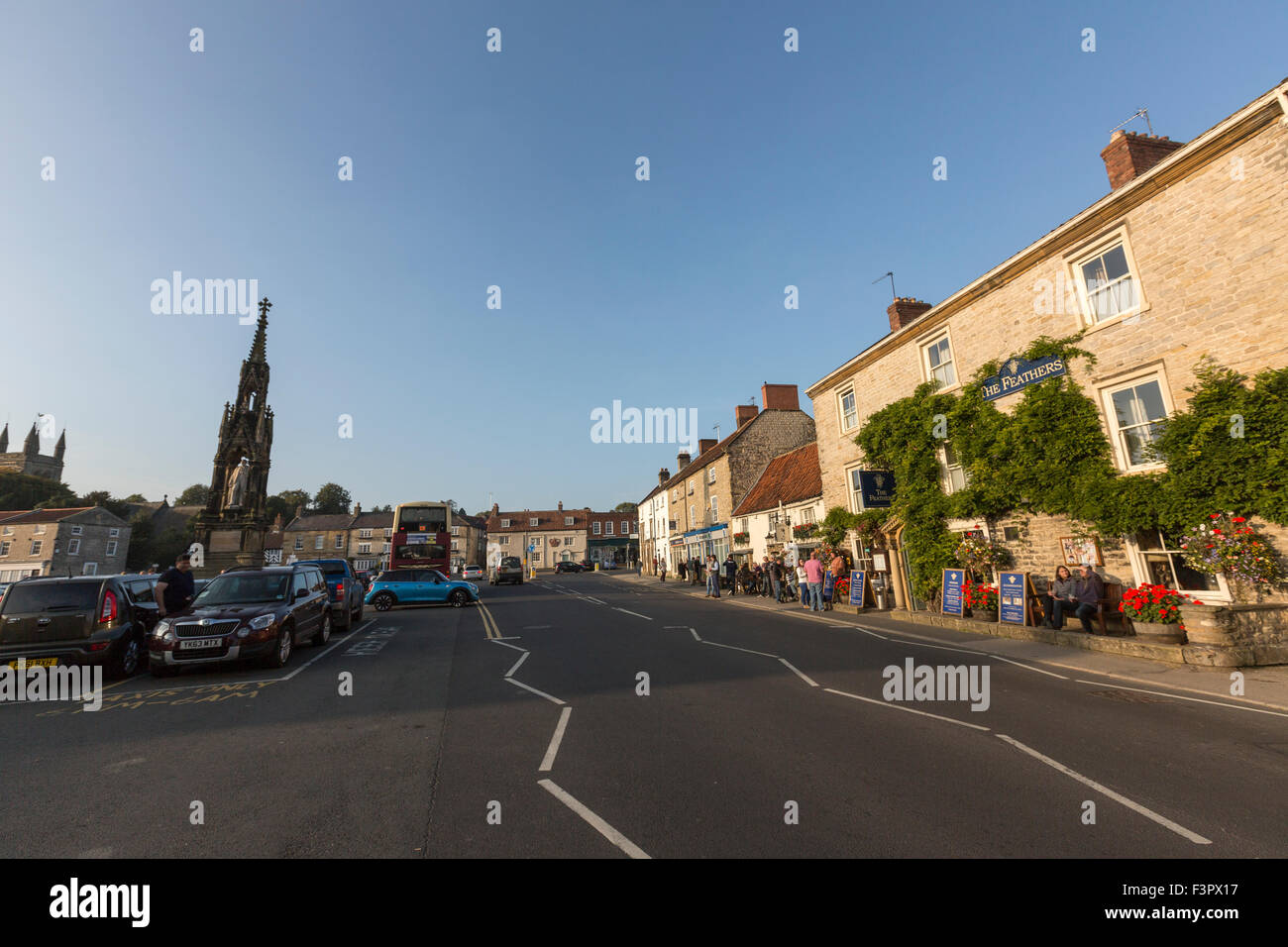 People drinking outside pubs in Helmsley Market Place, Helmsley, North ...