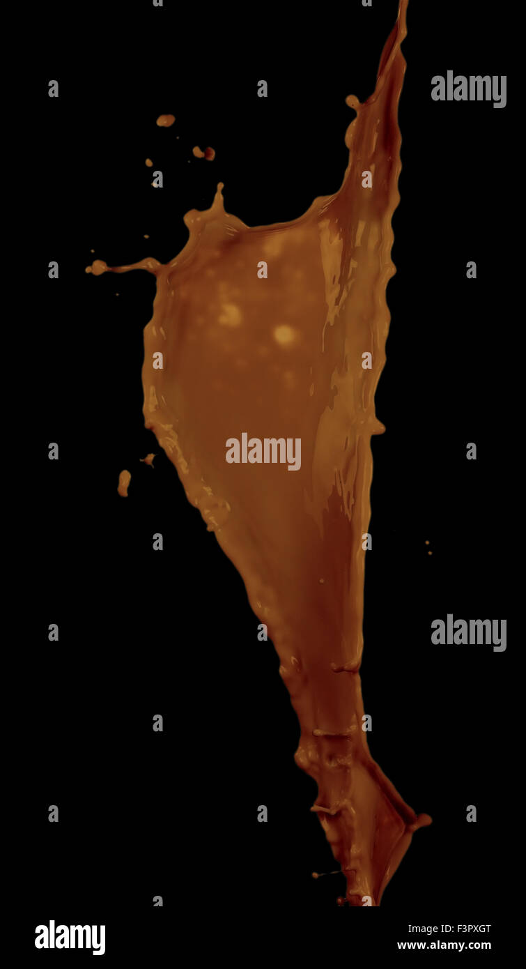 cocoa milk splash on the black background Stock Photo - Alamy