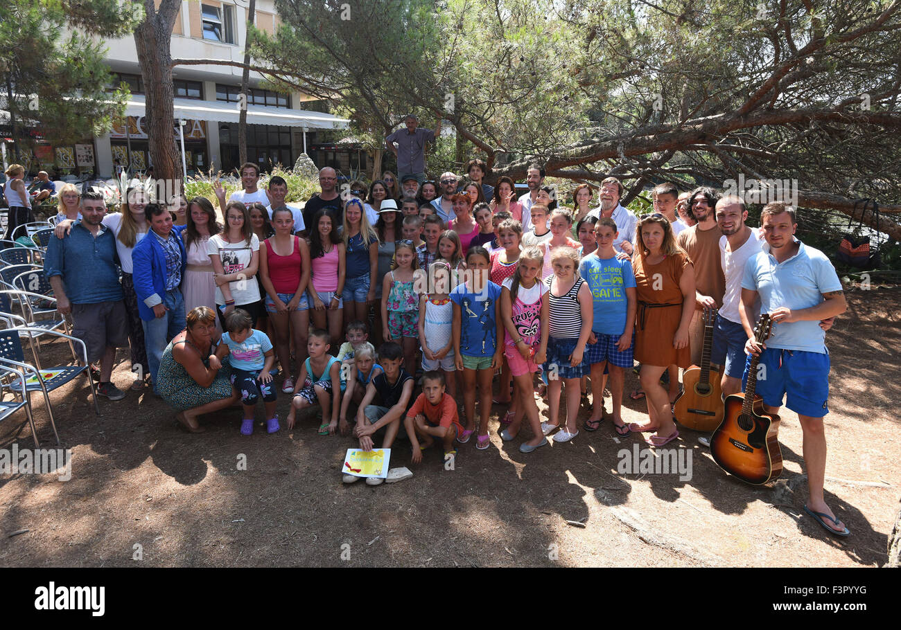 The famous professor and composer Nigel Osborne organizes a musical ...