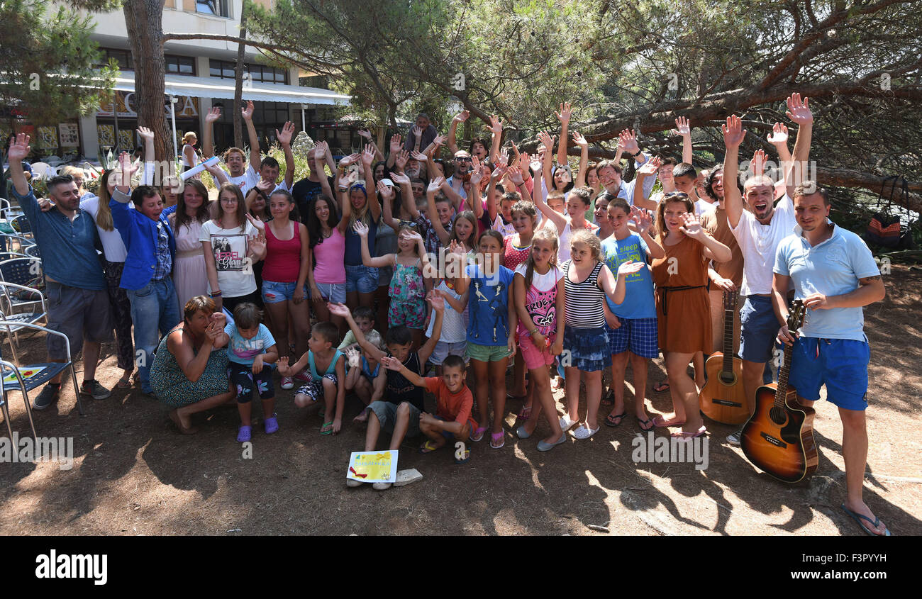 The famous professor and composer Nigel Osborne organizes a musical ...