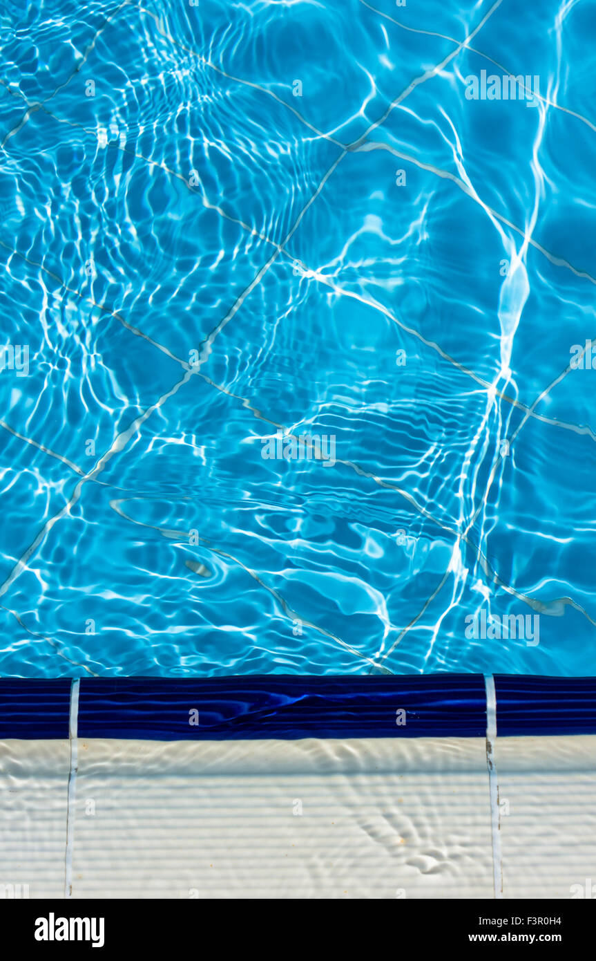 Blue swimming pool rippled water detail Stock Photo - Alamy