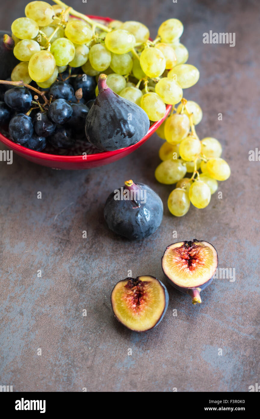 Ripe fig fruits on the dark vintage background. Selective focus Stock ...