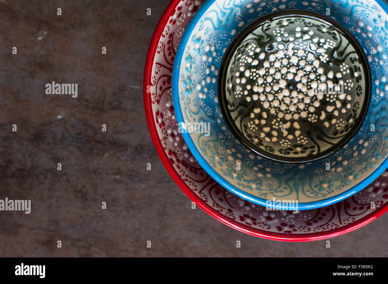 Different colors vintage eastern plates on the dark background Stock ...