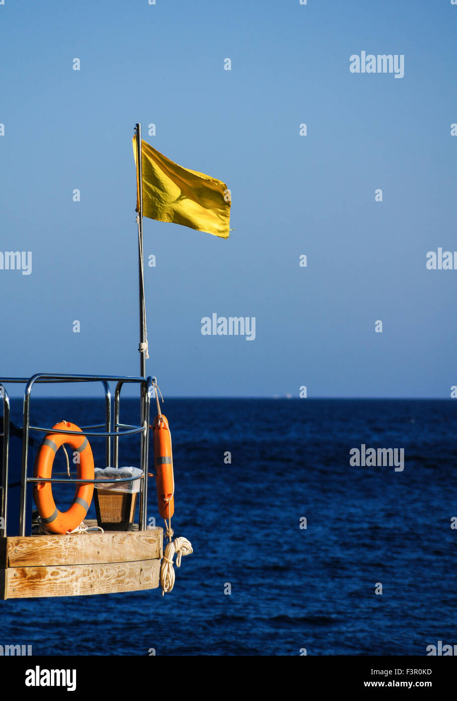 Sun blue flag beach hi-res stock photography and images - Alamy