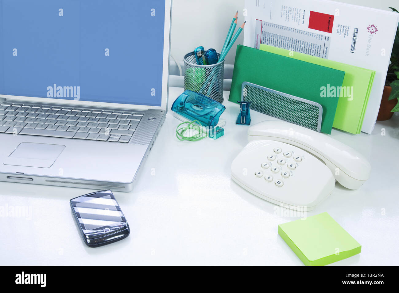 Home and Business office interior set up with a mobile phone and laptop ...