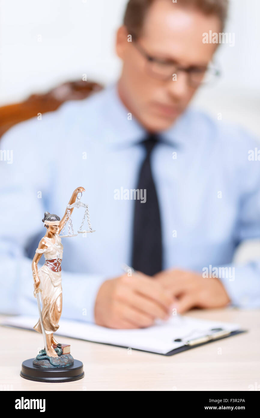Professional lawyer holding folder Stock Photo - Alamy