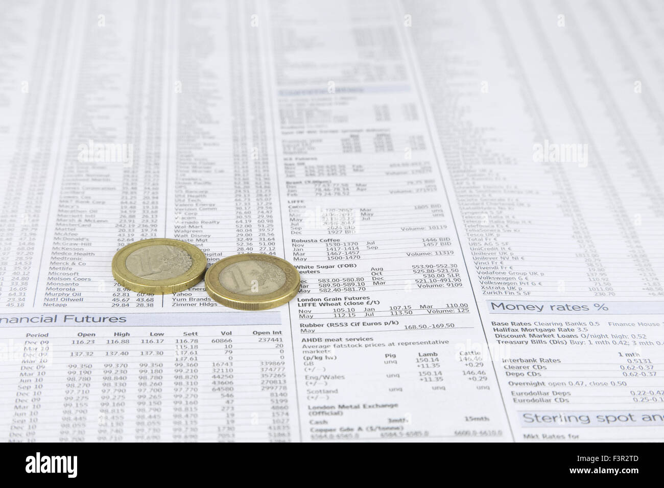 European Union One Euro coins on a News paper Stock market financial ...