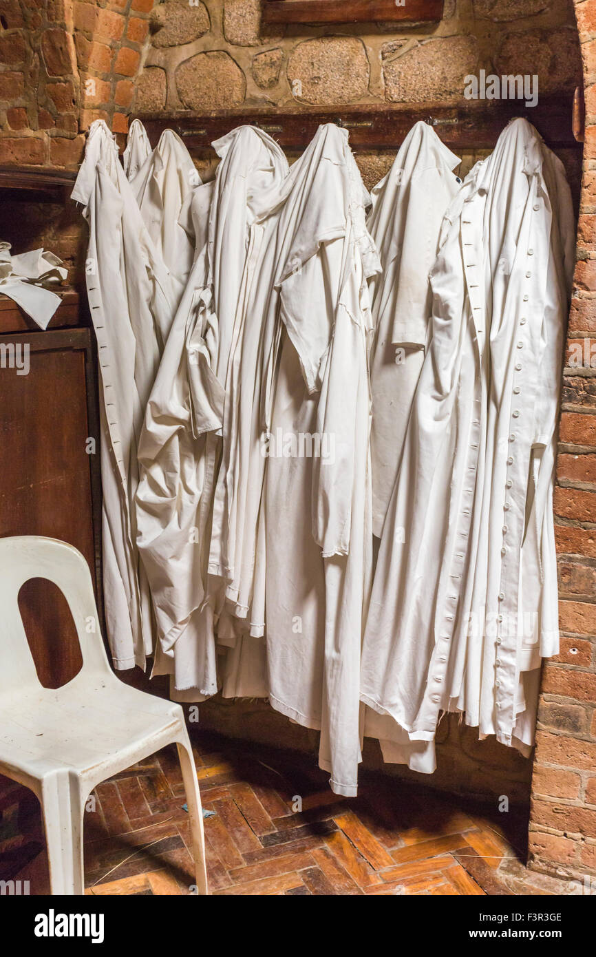 White priests' robes hanging in St Peter's Cathedral, Likoma Island ...