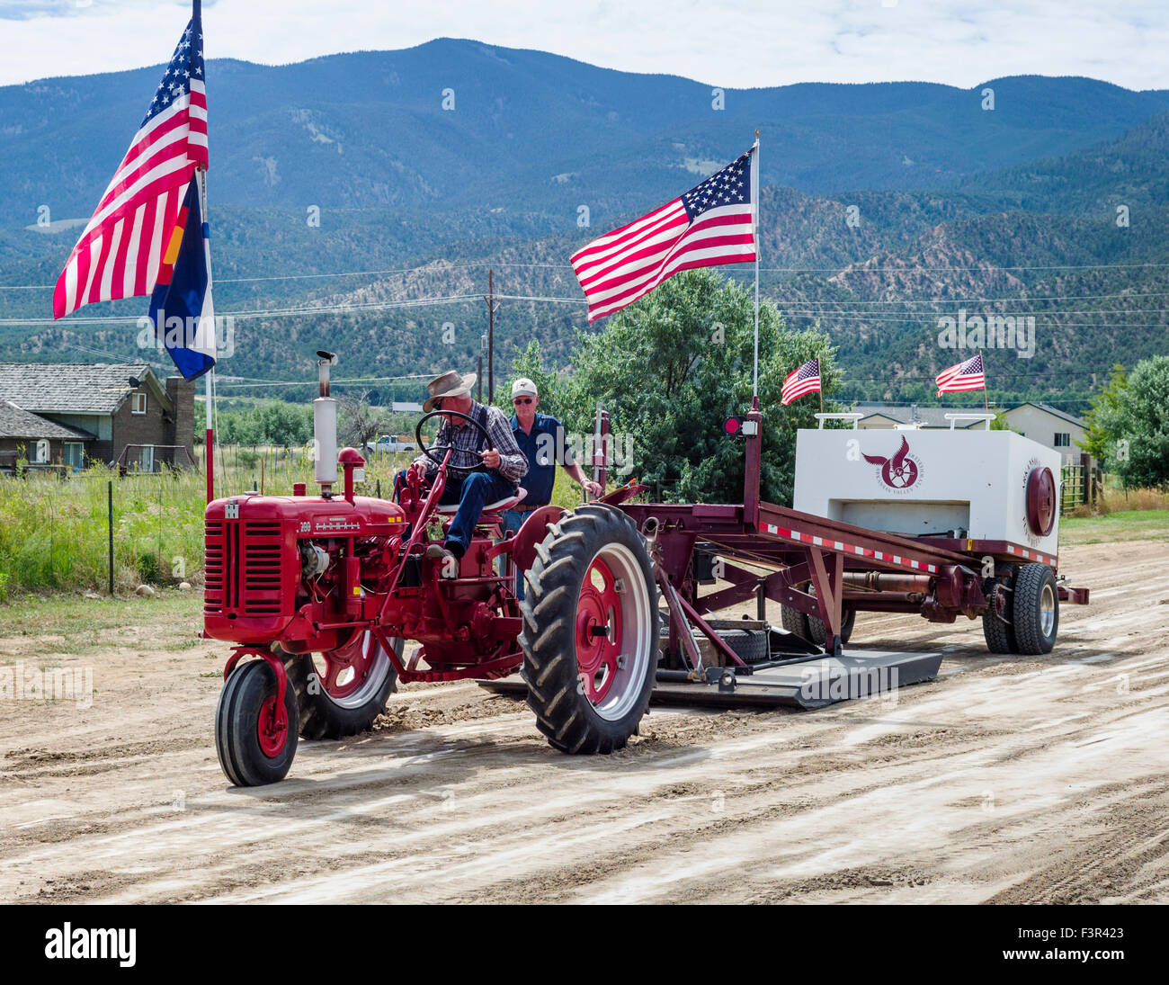 Rancher driving antique tractor, Antique Tractor Pull Event, Chaffee ...