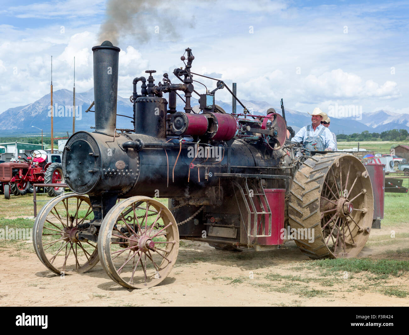 Rancher driving antique steam engine tractor, Chaffee County Fair ...