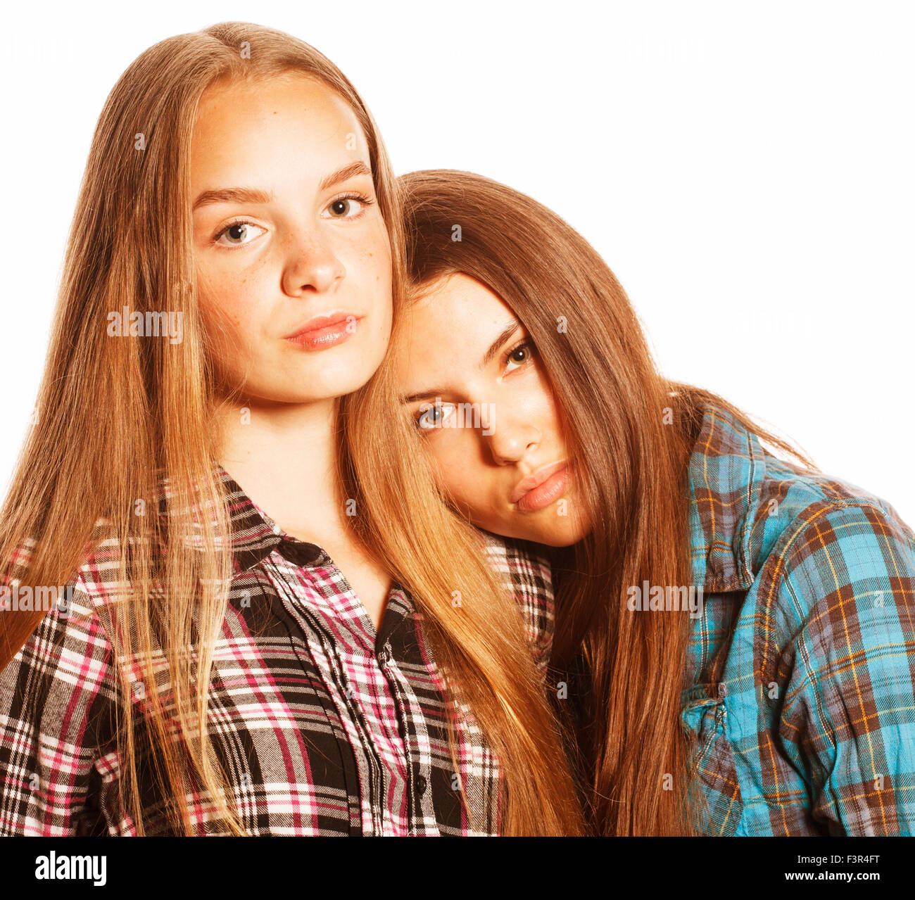 two cute teenagers having fun together isolated on white Stock Photo ...