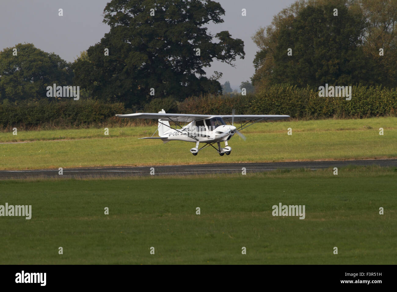 Single engined light aircraft landing at Wolverhampton Halfpenny Green ...