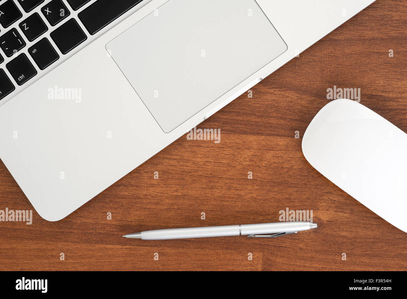 The laptop on the table close-up, top view Stock Photo - Alamy