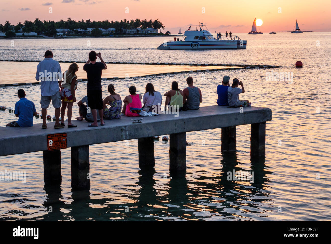 Key West Florida,Keys,pier,Gulf of Mexico,Sunset Island,setting sun ...