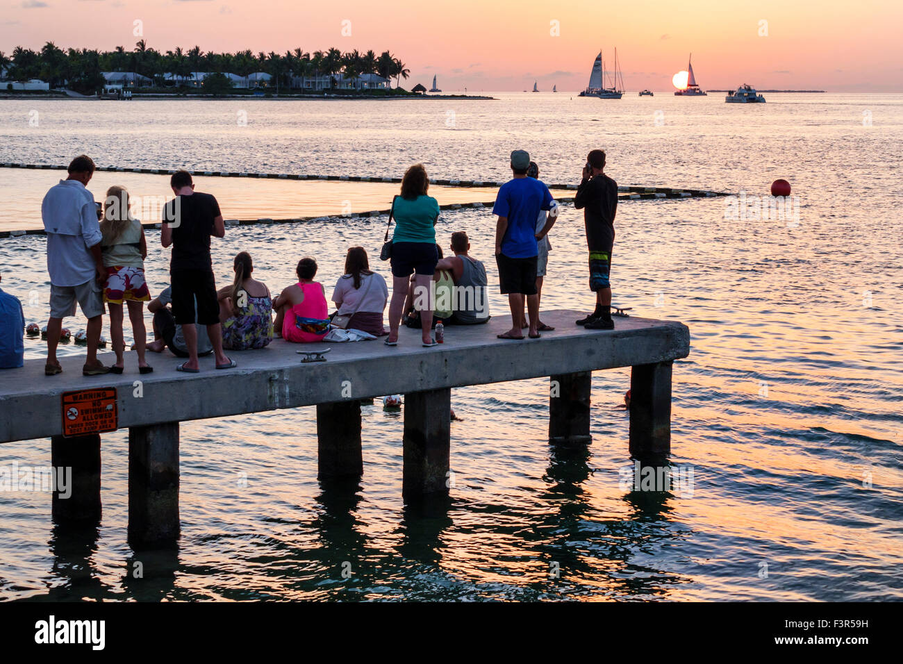 Key West Florida,Keys,pier,Gulf of Mexico,Sunset Island,setting sun ...