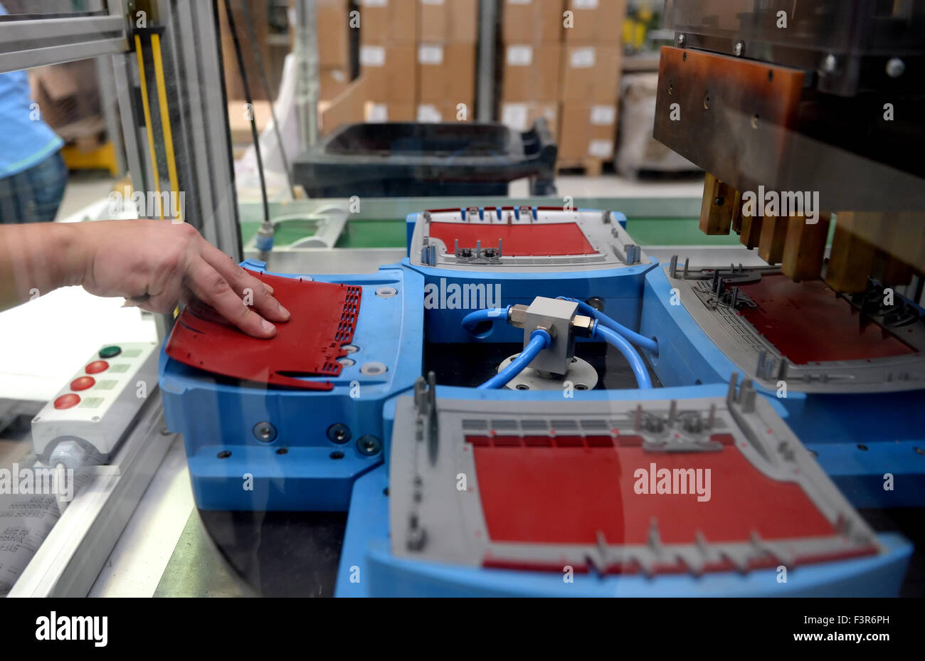 Berlin, Germany. 08th Oct, 2015. A part of a router is processed ...