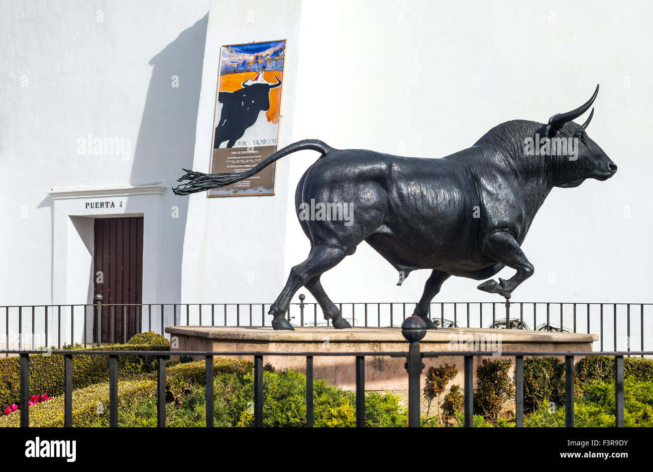 Spain, Andalusia, Ronda, a bull monument in front of Plaza de Toros ...