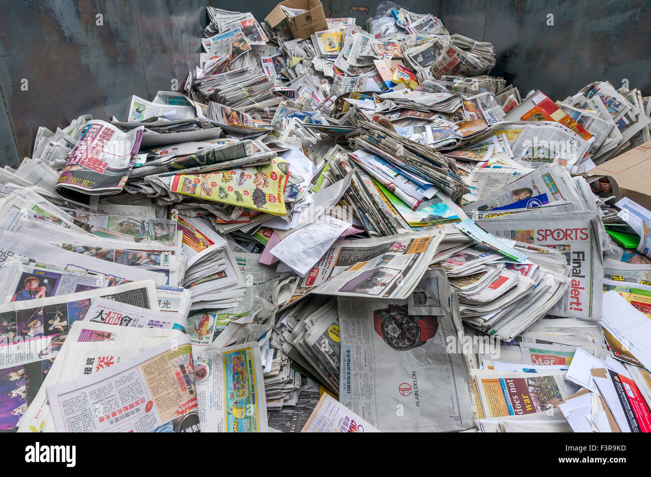 A stack of old newspaper for recycle Stock Photo - Alamy