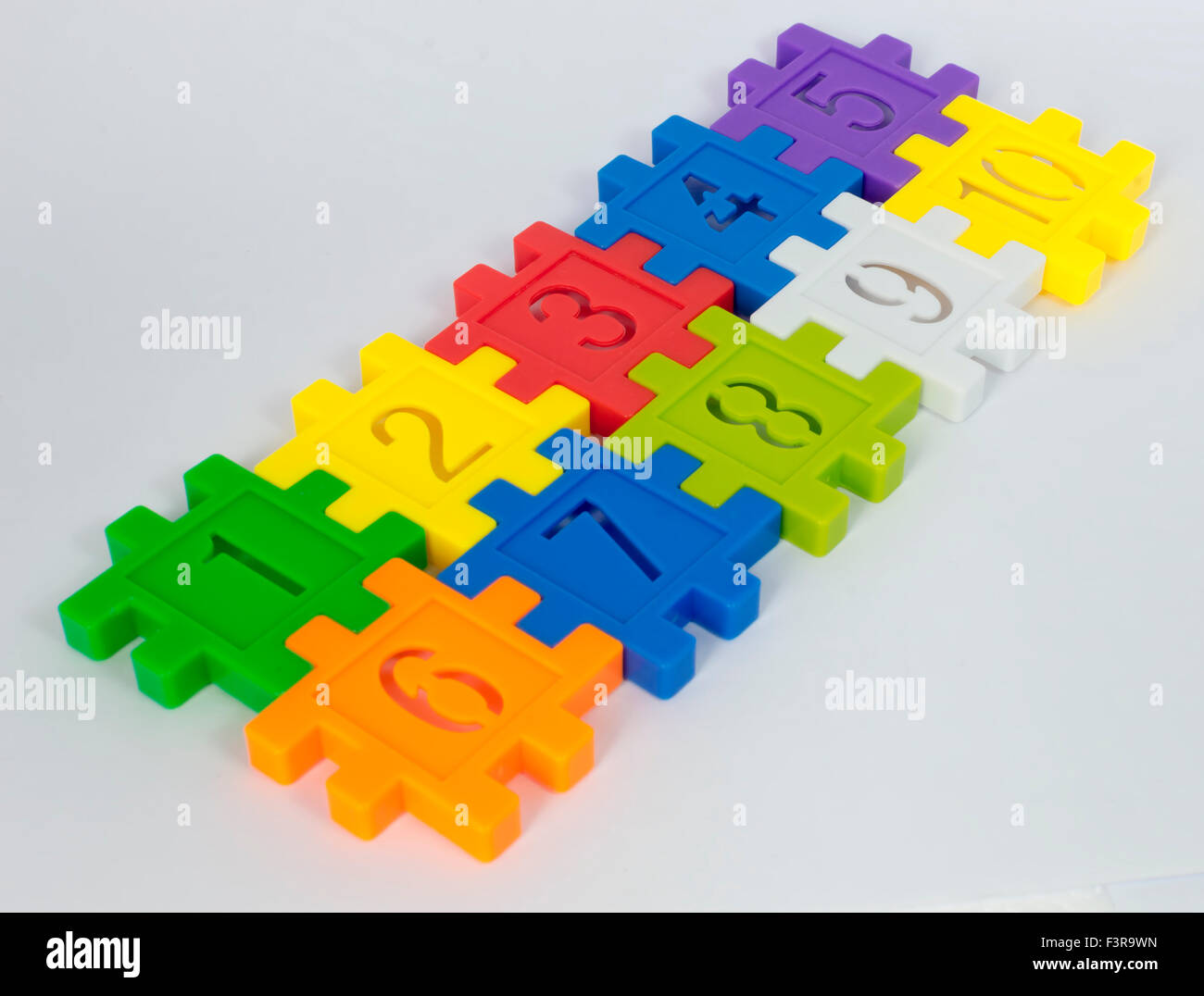 Colorful toy of numbers with white background Stock Photo - Alamy