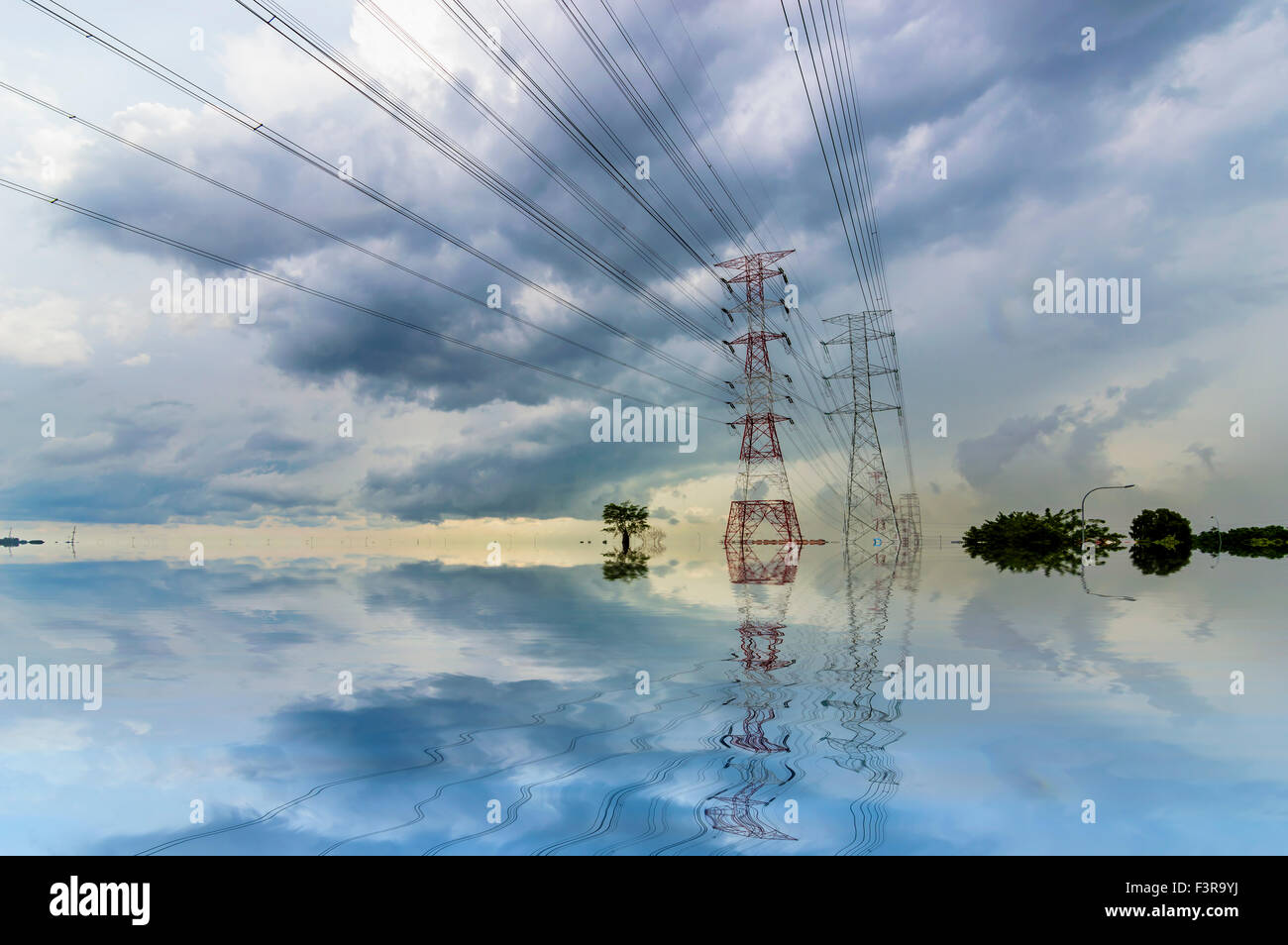 Pylon and reflection with cloudy background Stock Photo - Alamy