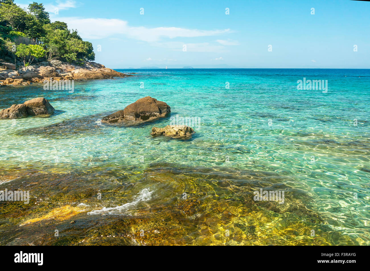 Island with clean and clear water at Perhentian Island, Malaysia Stock ...