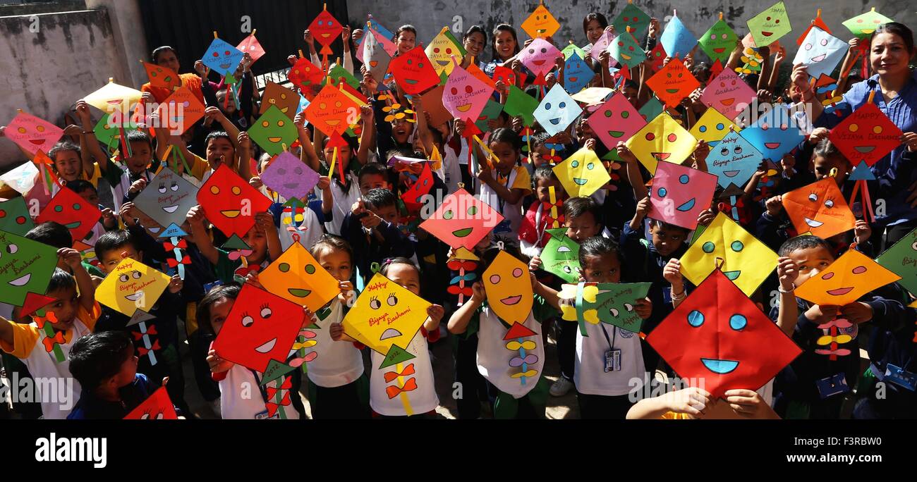 Kathmandu, Nepal. 12th Oct, 2015. Nepalese children hold their handmade ...