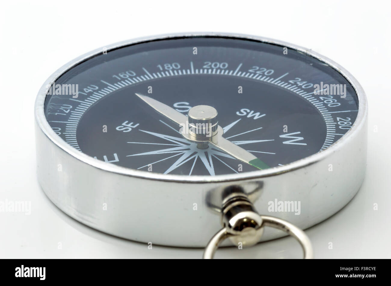 Compass isolated on white with selective focused Stock Photo - Alamy