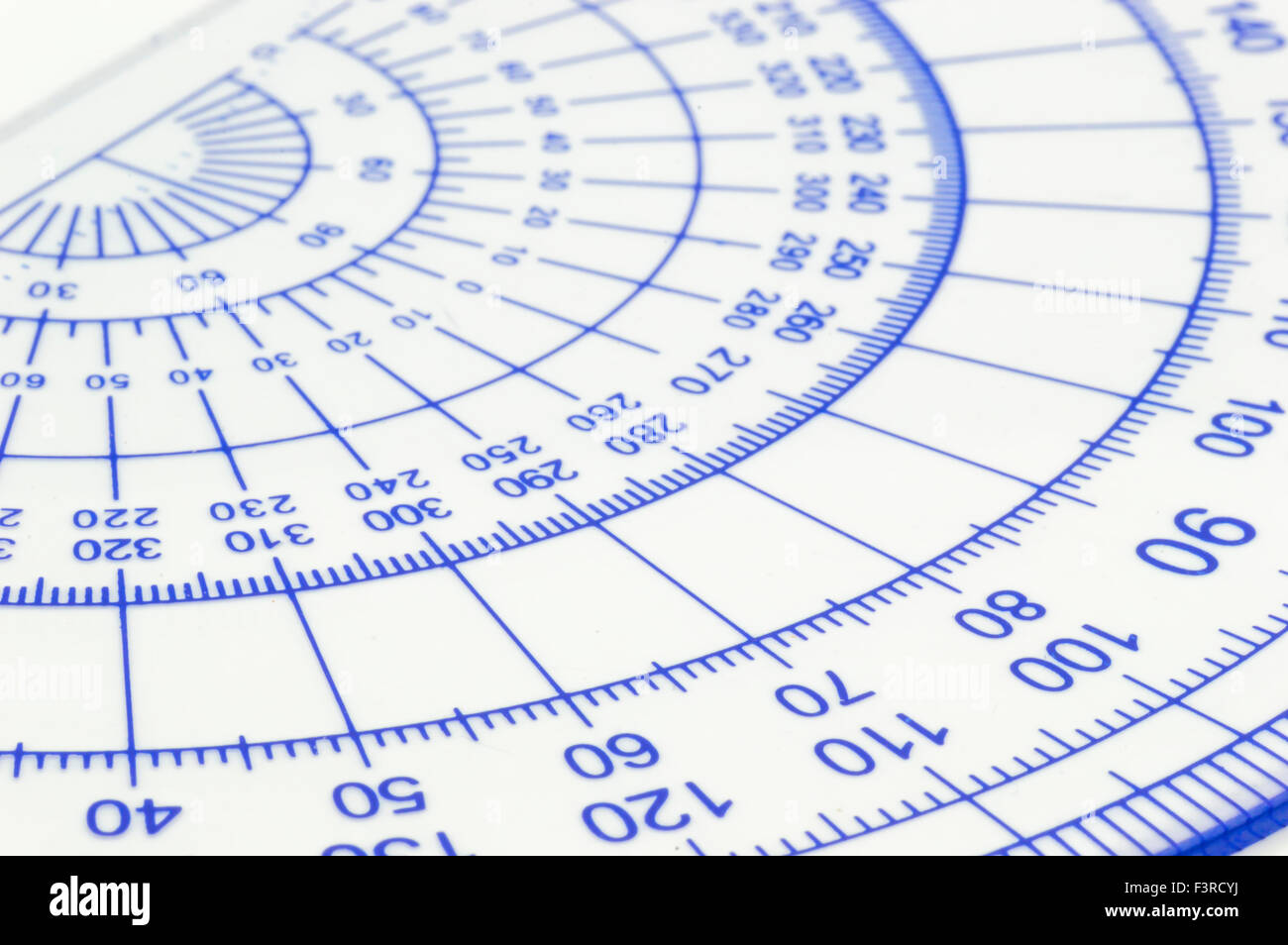 Geometry ruler macro isolated white background Stock Photo - Alamy