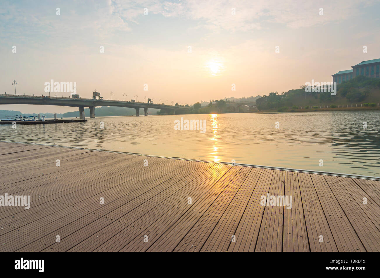 Wooden platform with morning mist Stock Photo - Alamy