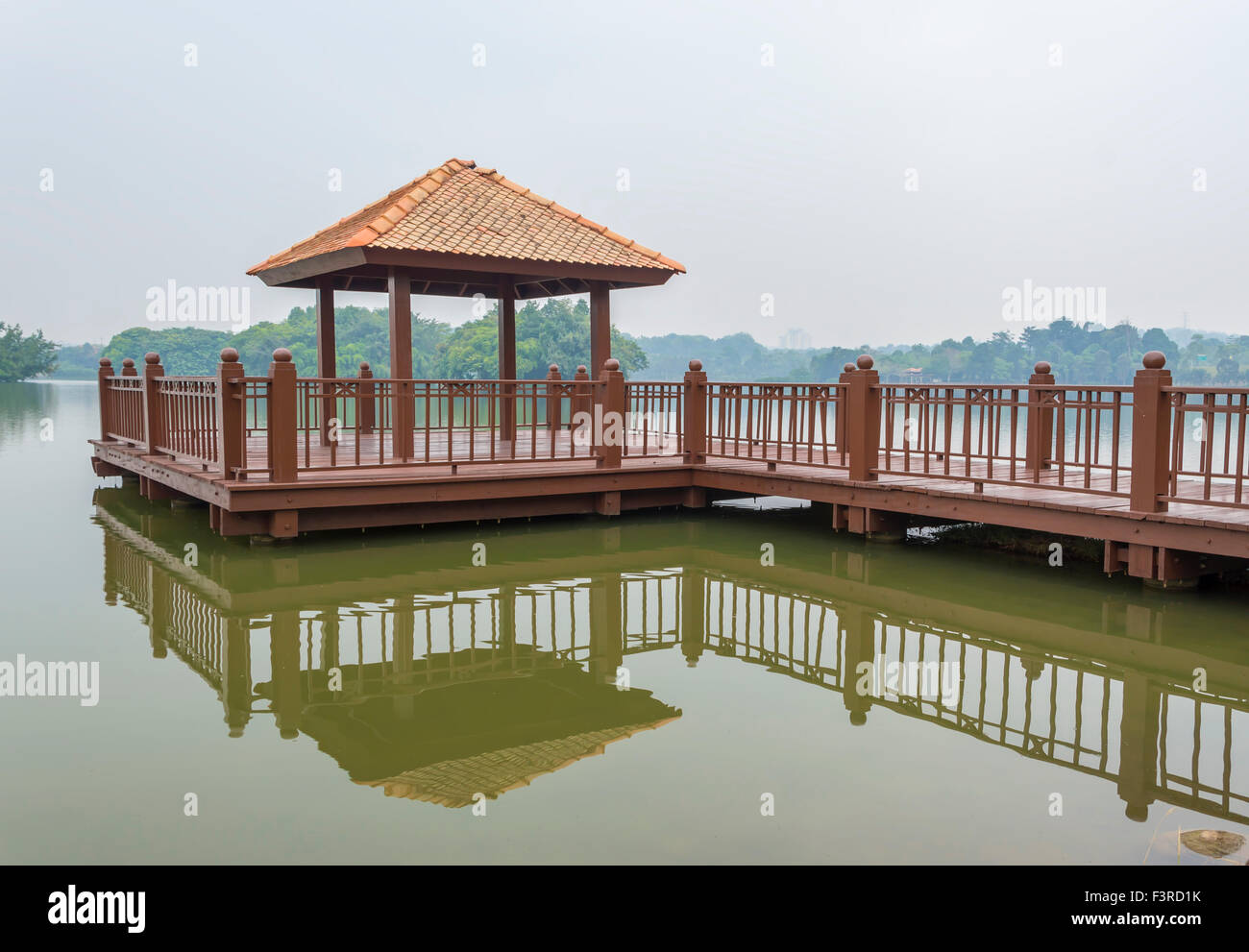 Wooden jetty with morning mist Stock Photo - Alamy