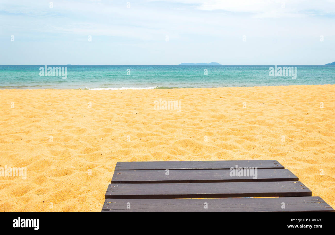 Yellow sand at sea shore facing to green ocean. Focused at sand Stock ...