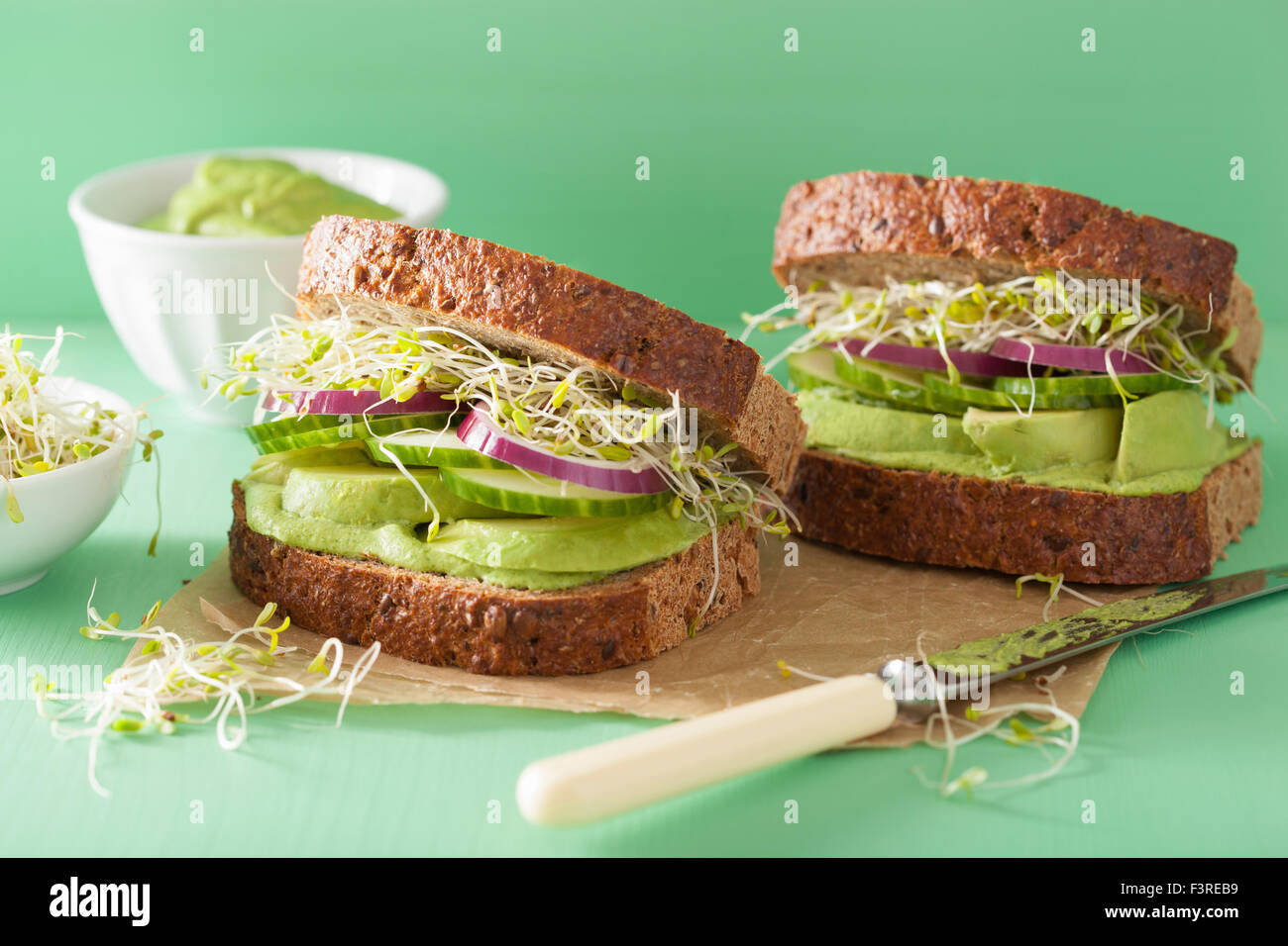 healthy avocado sandwich with cucumber alfalfa sprouts onion Stock ...