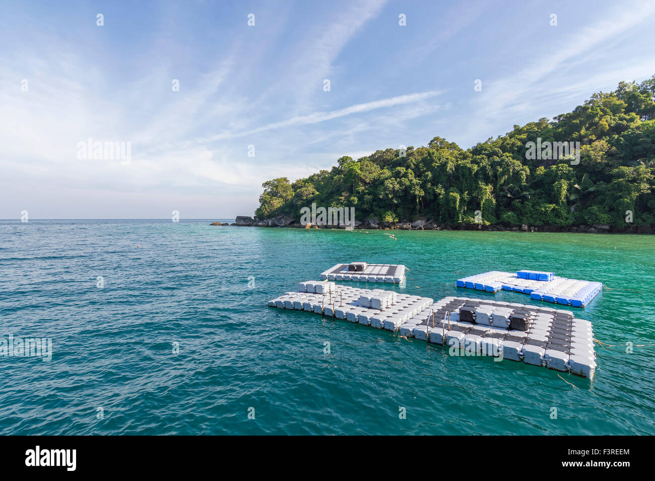 Empty swim platform floating on a lake Stock Photo - Alamy