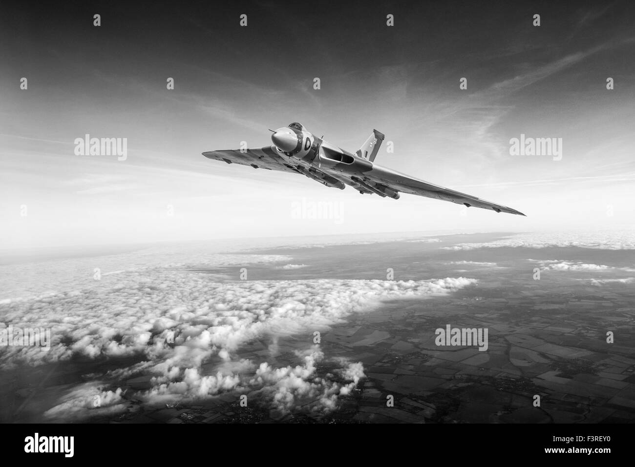 A depiction of an Avro Vulcan delta wing strategic bomber in the skies ...