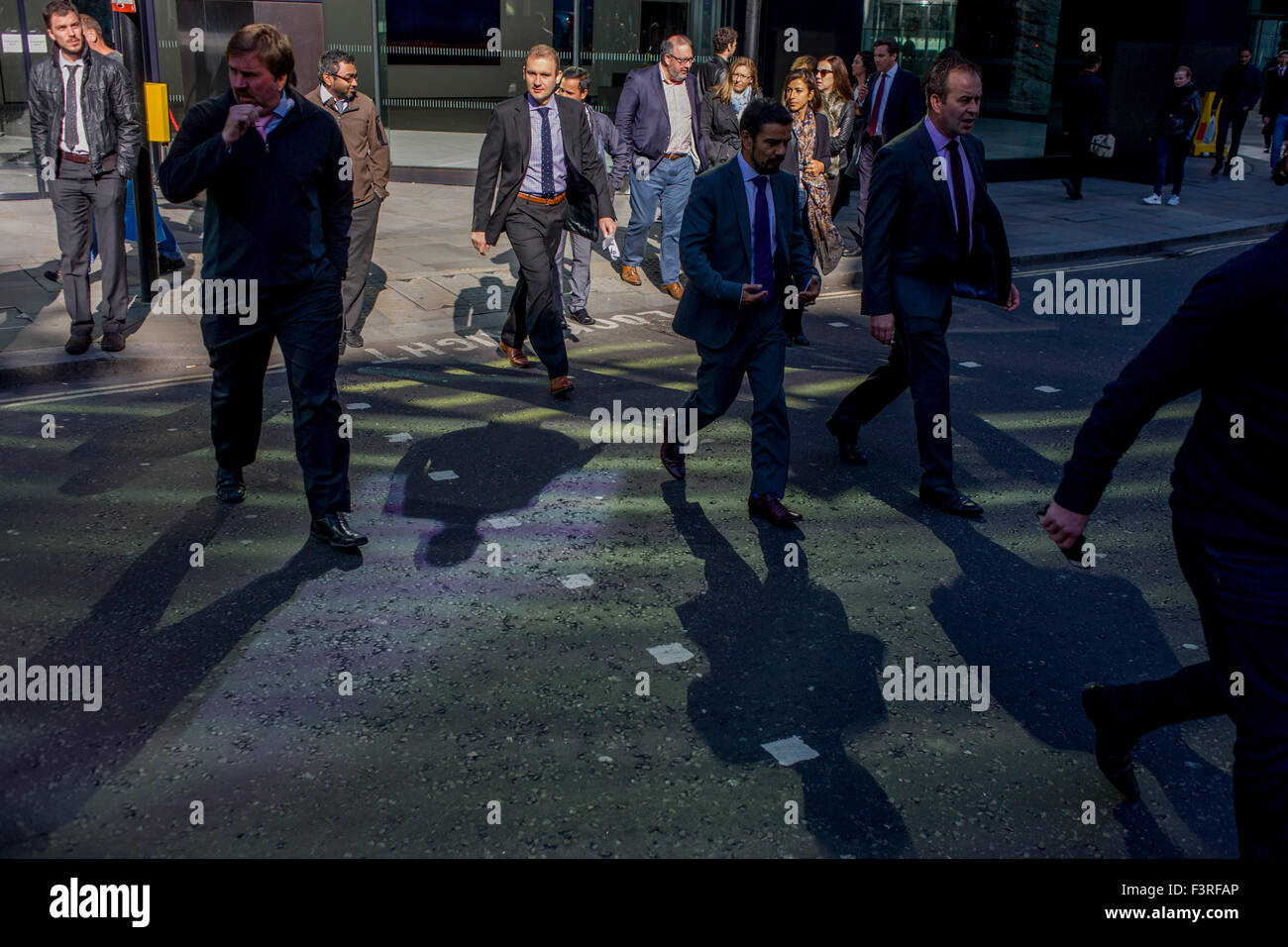 Men in suits crossing the road hi-res stock photography and images - Alamy